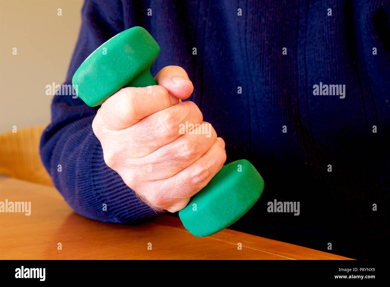Hand dumbell man hi-res stock photography and images - Alamy