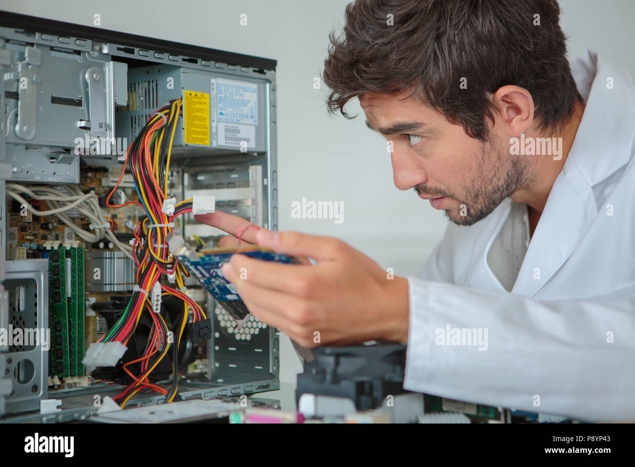 man fix server network in data center room Stock Photo - Alamy