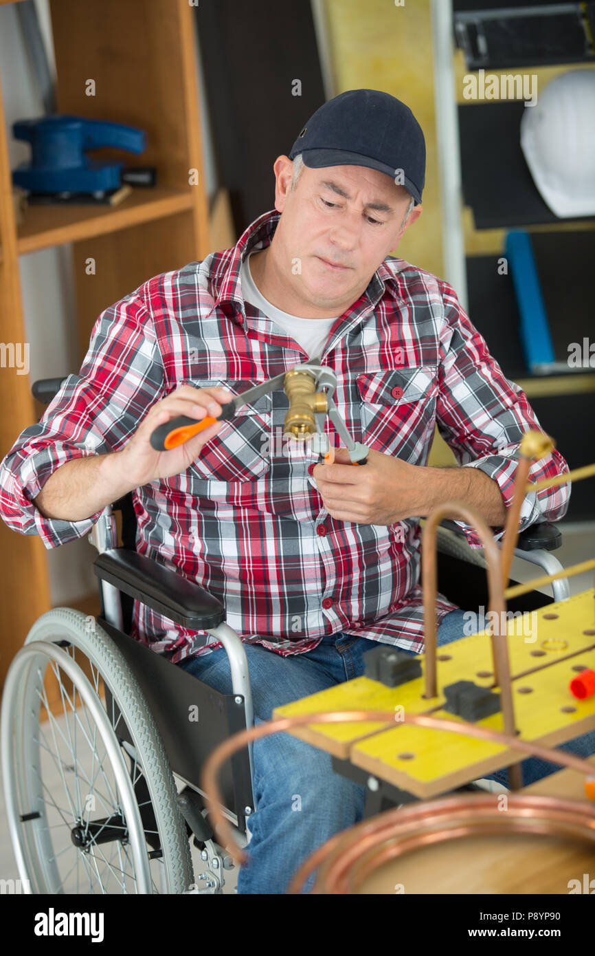 construction worker in a wheelchair Stock Photo - Alamy