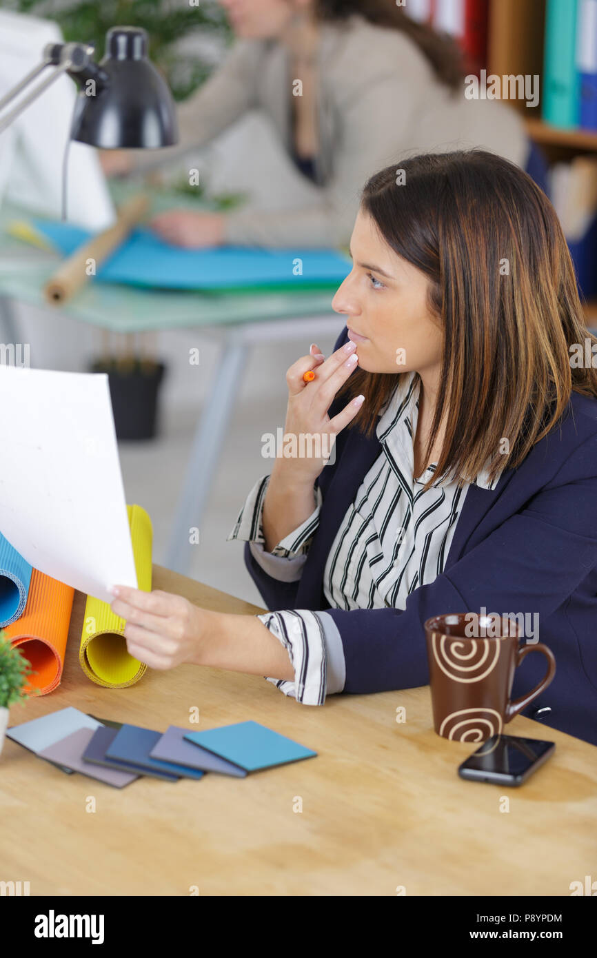 female designer in office working with colour samples Stock Photo - Alamy