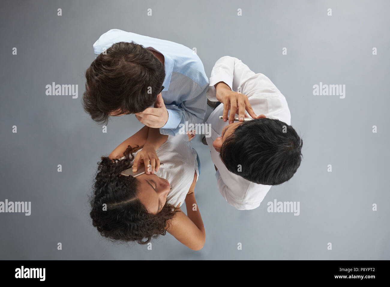 Group of people talk on phone isolated on gray background above top ...