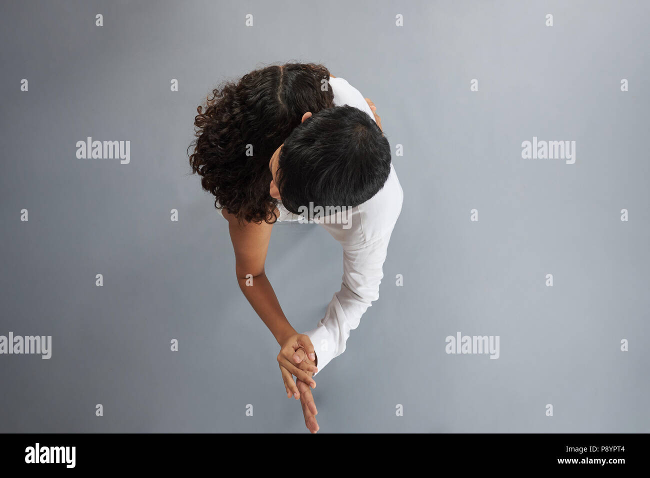 Young couple dancing isolated on gray background above top view Stock ...