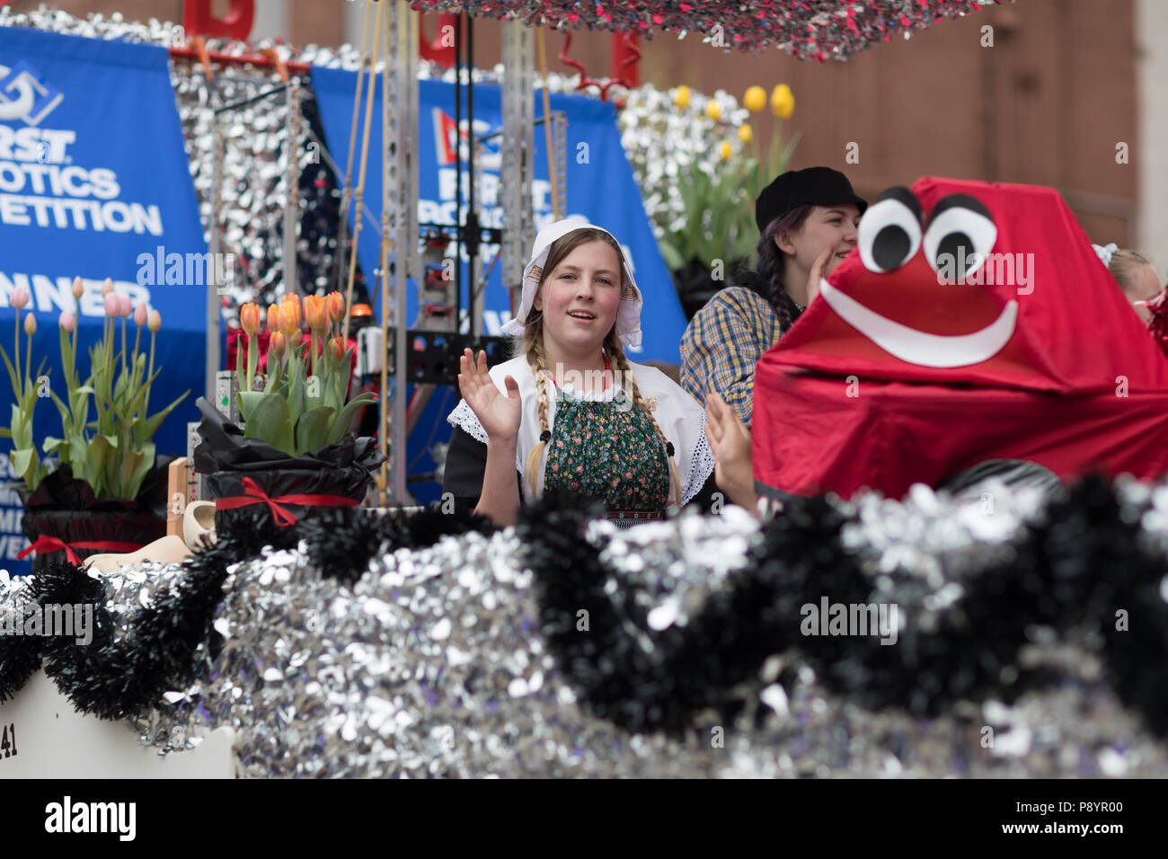 Holland, Michigan, USA - May 12, 2018 A young woman wearing traditional ...