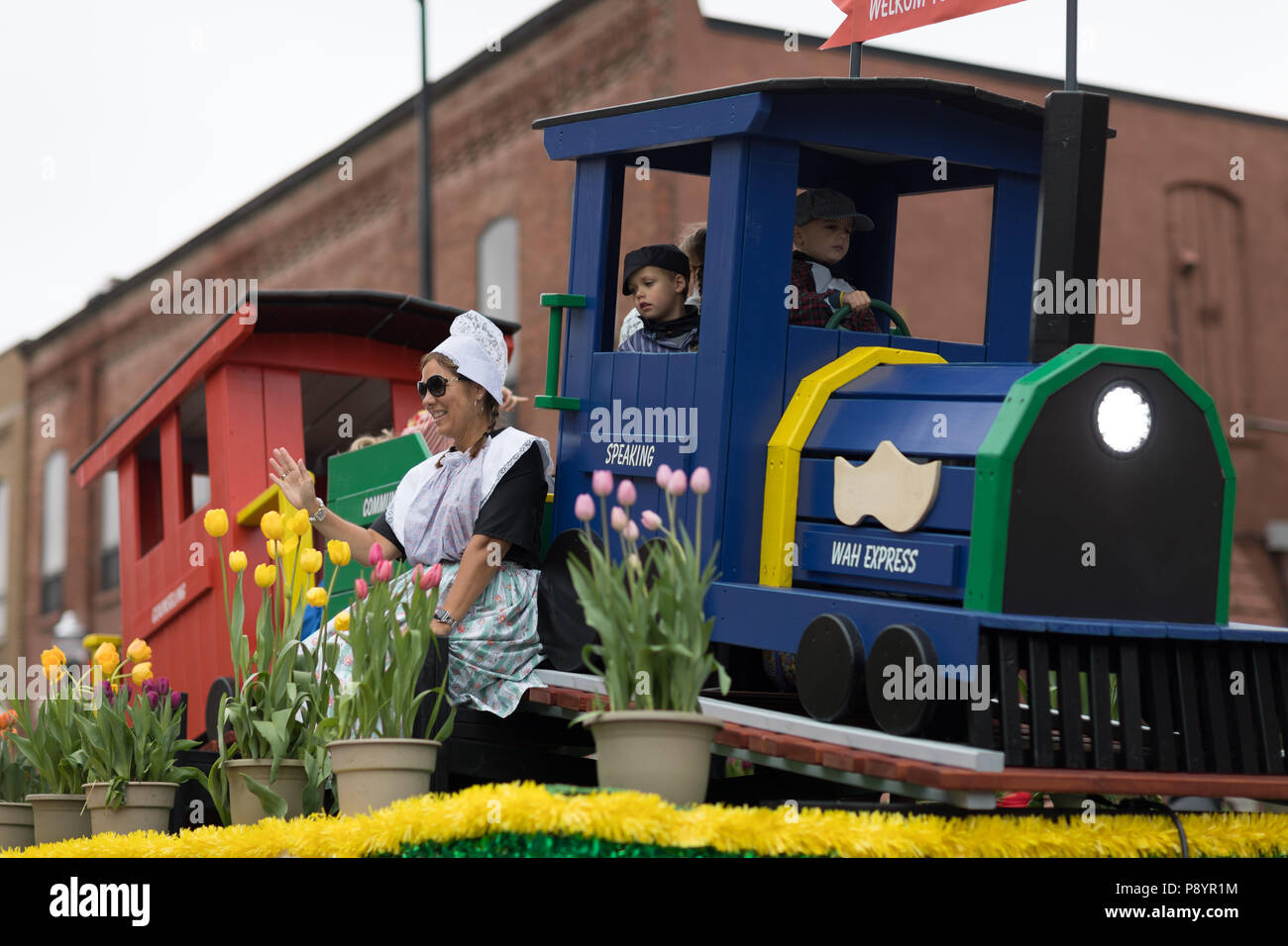 Holland, Michigan, USA - May 12, 2018 Woman and children wearing ...