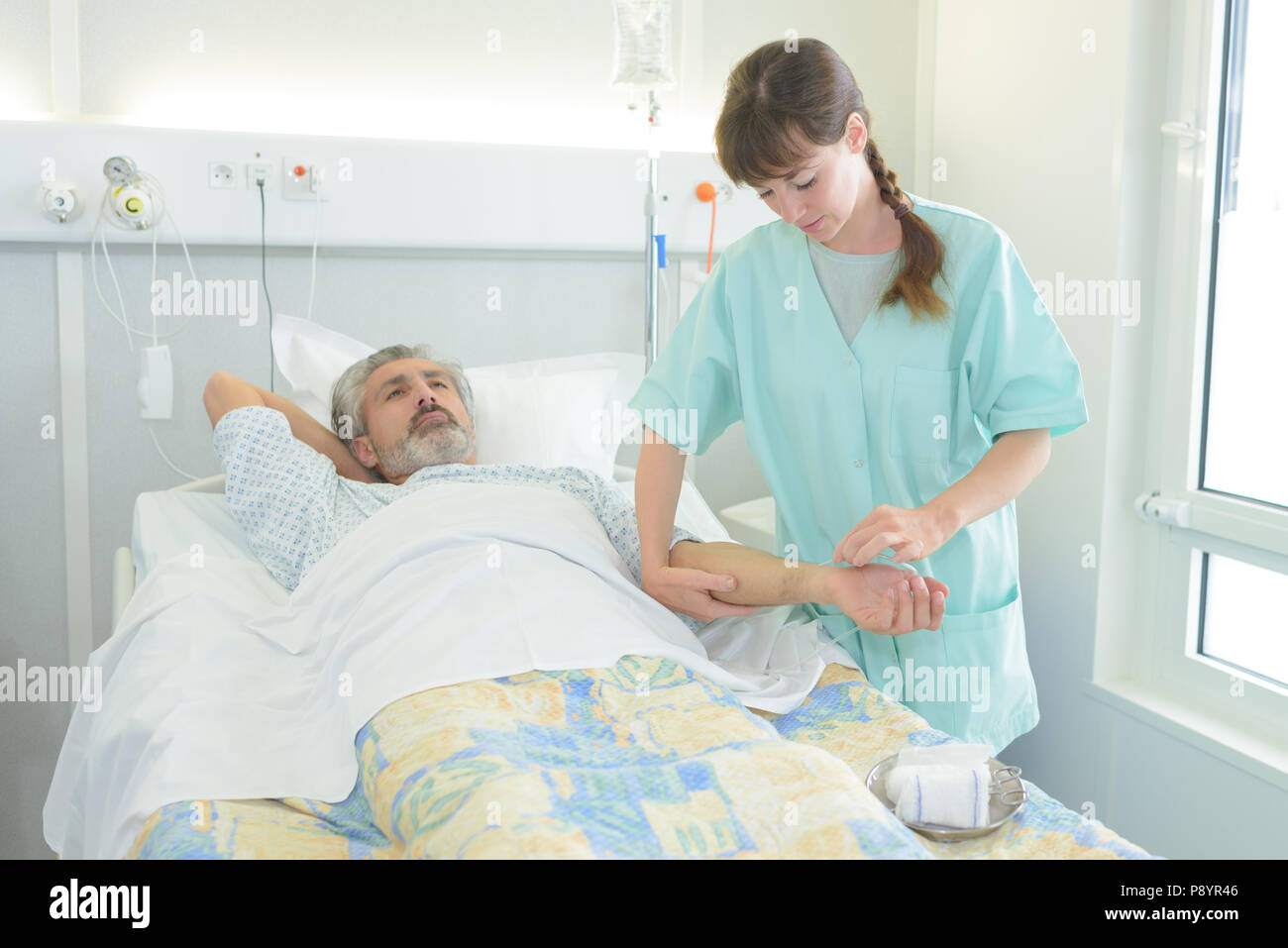 Doctor nurse checking medical report hi-res stock photography and ...
