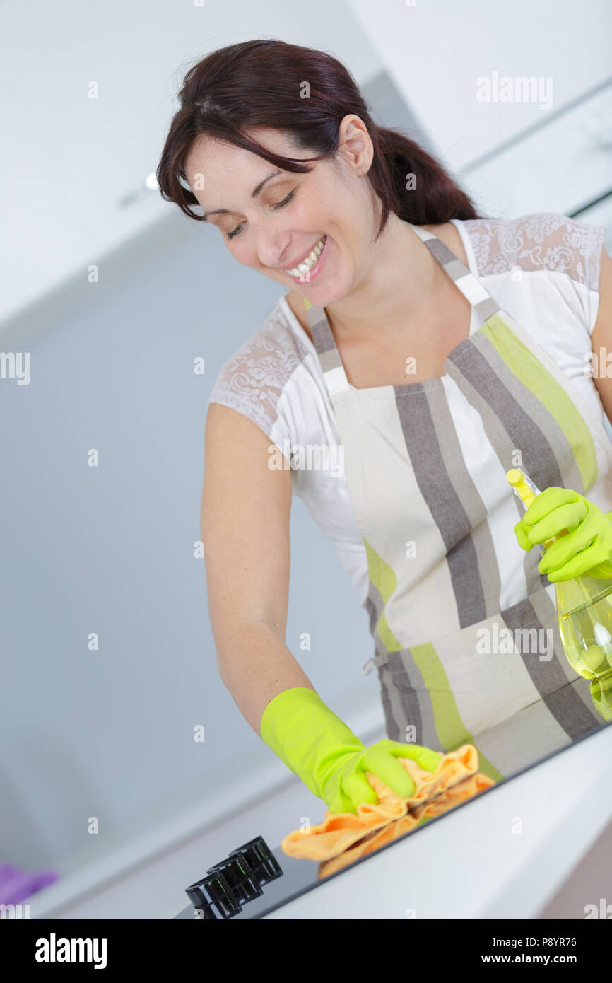 Girl cleaning kitchen furniture hi-res stock photography and images - Alamy