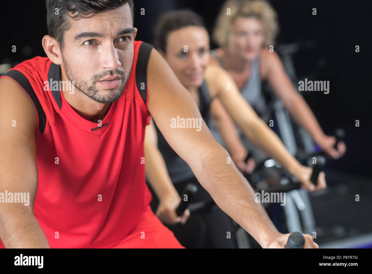 Man in spinning class hi-res stock photography and images - Alamy