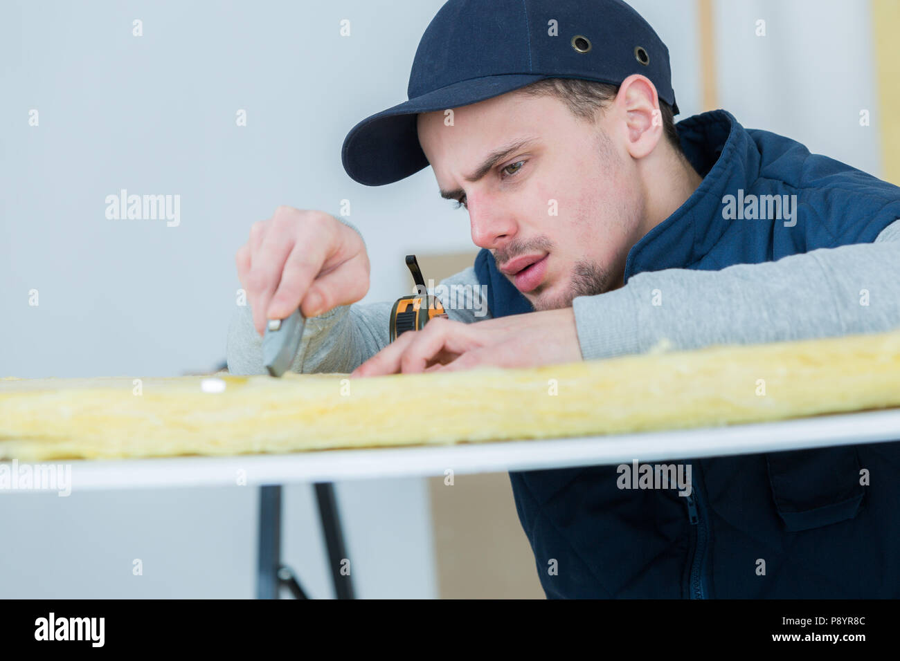 carpenter scrapping wood Stock Photo - Alamy