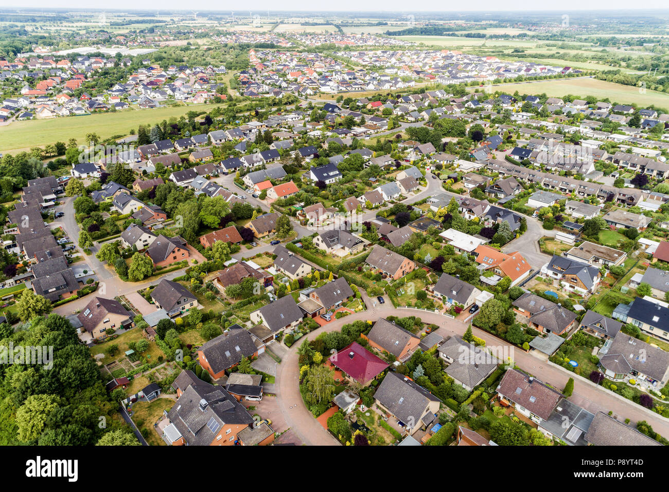 Aerial view of a suburb with detached houses, semi-detached houses and ...