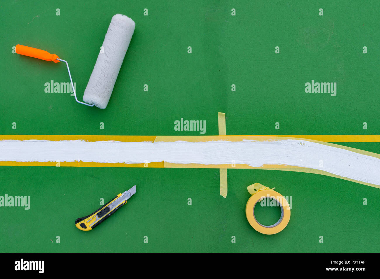 sideline for an outdoor stadium being prepared with tools Stock Photo ...