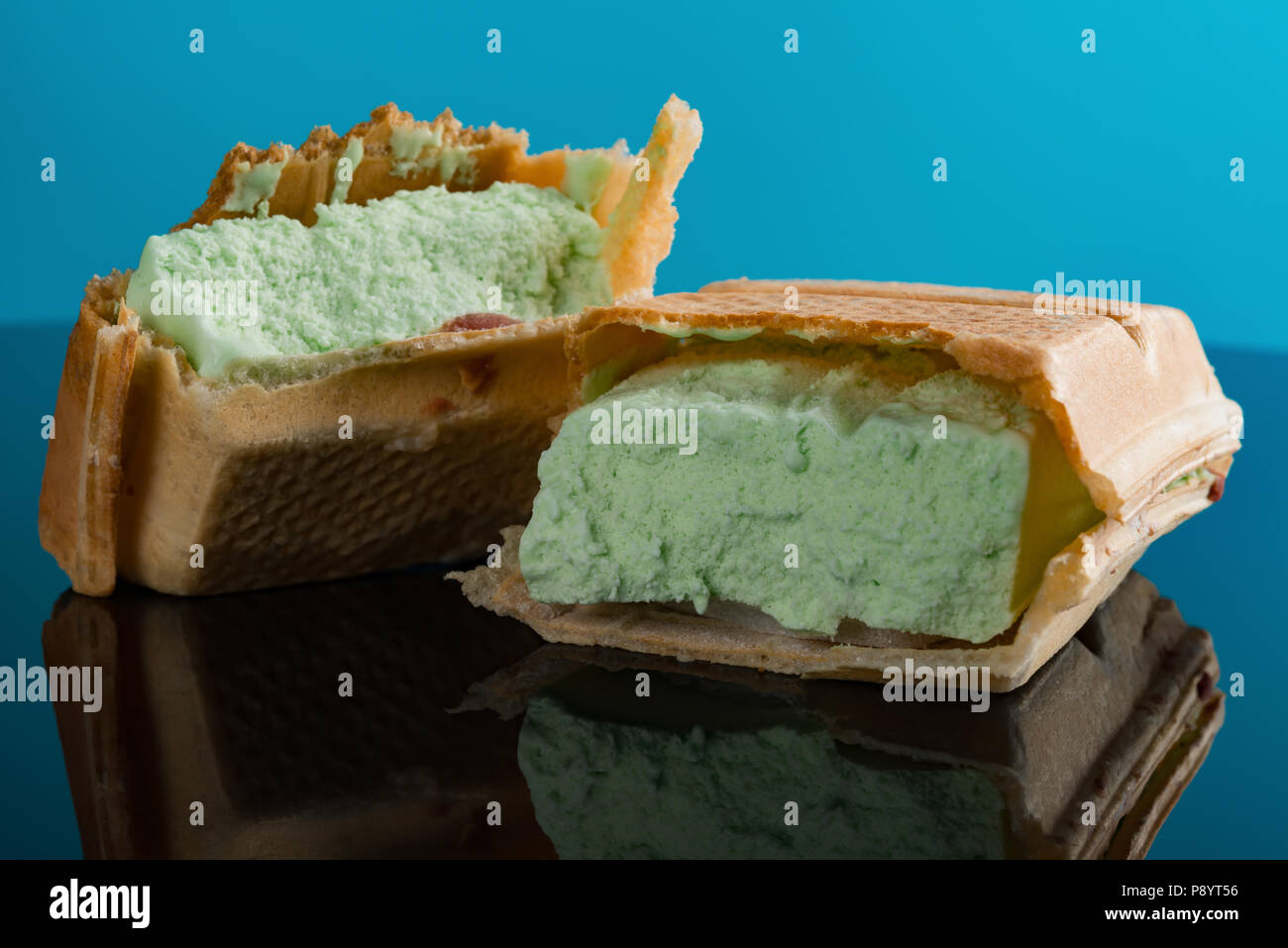 studio shoot of ice cream block on blue with reflection Stock Photo - Alamy