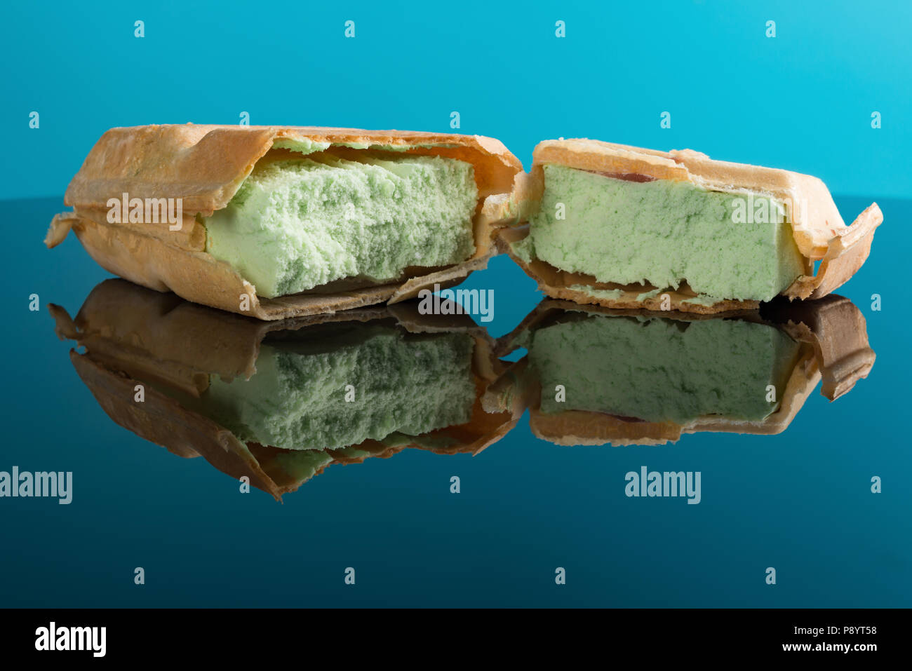 studio shoot of ice cream block on blue with reflection Stock Photo - Alamy