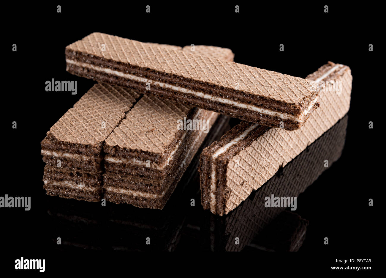 vanilla flavor wafer blocks on black background Stock Photo - Alamy