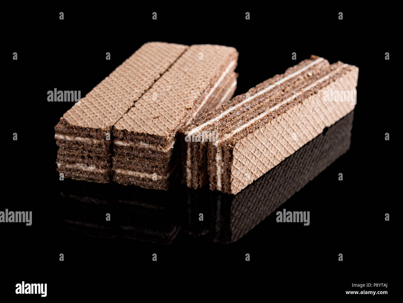 vanilla flavor wafer blocks on black background Stock Photo - Alamy