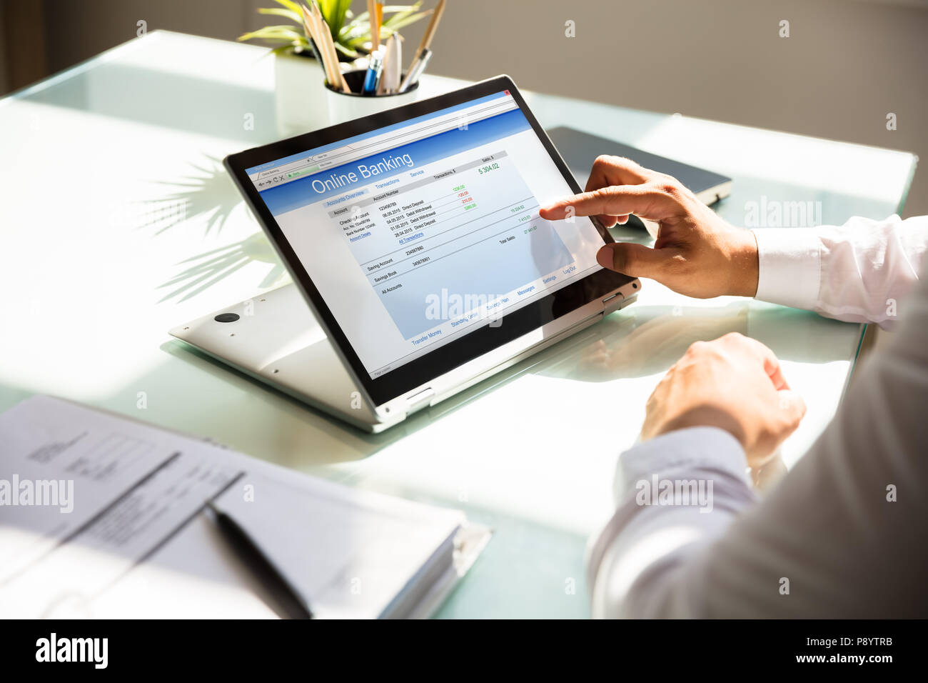 Businessman doing online banking hi-res stock photography and images ...