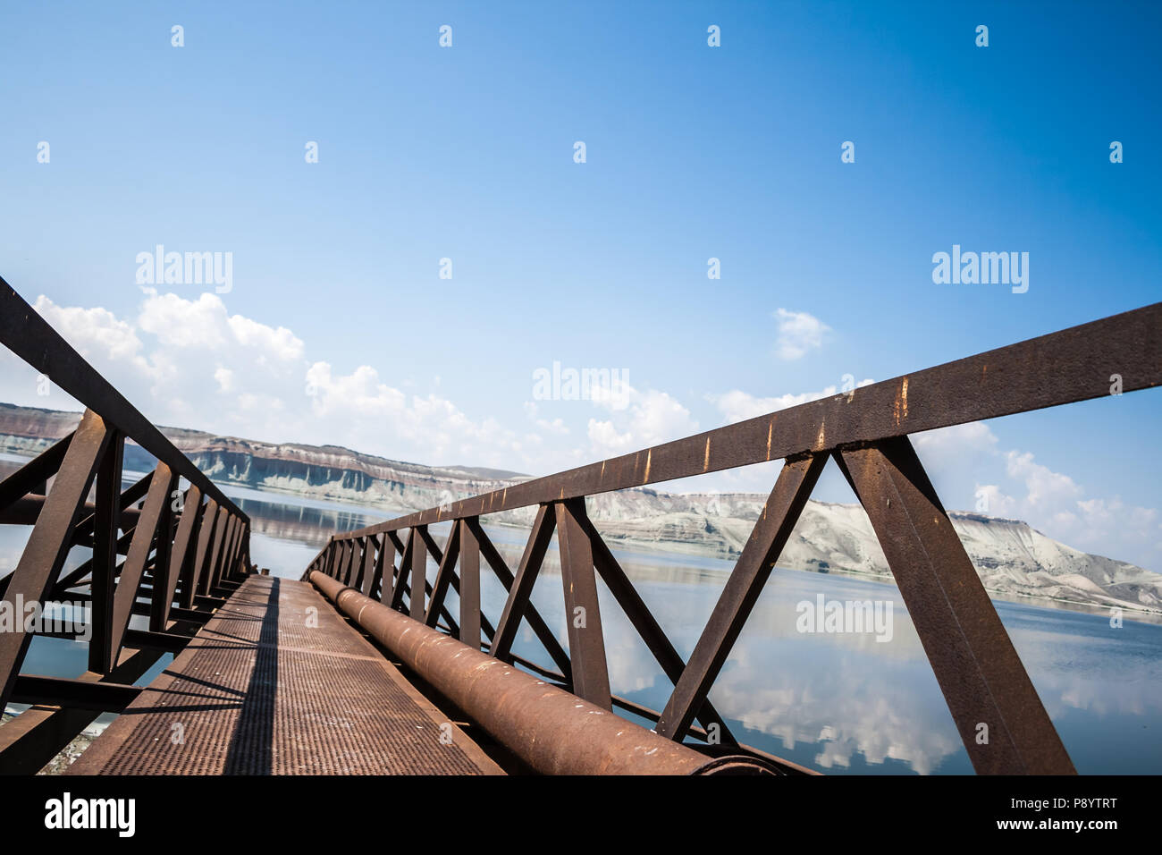 Water pumping pier for pipe line on lake Stock Photo - Alamy