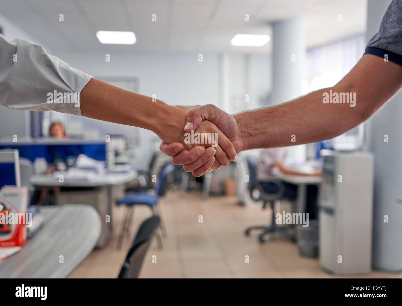 handshake of office employees Stock Photo - Alamy