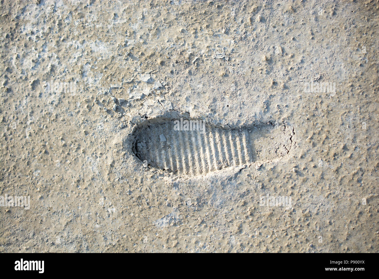 Footstep pattern seen on a concrete background Stock Photo - Alamy
