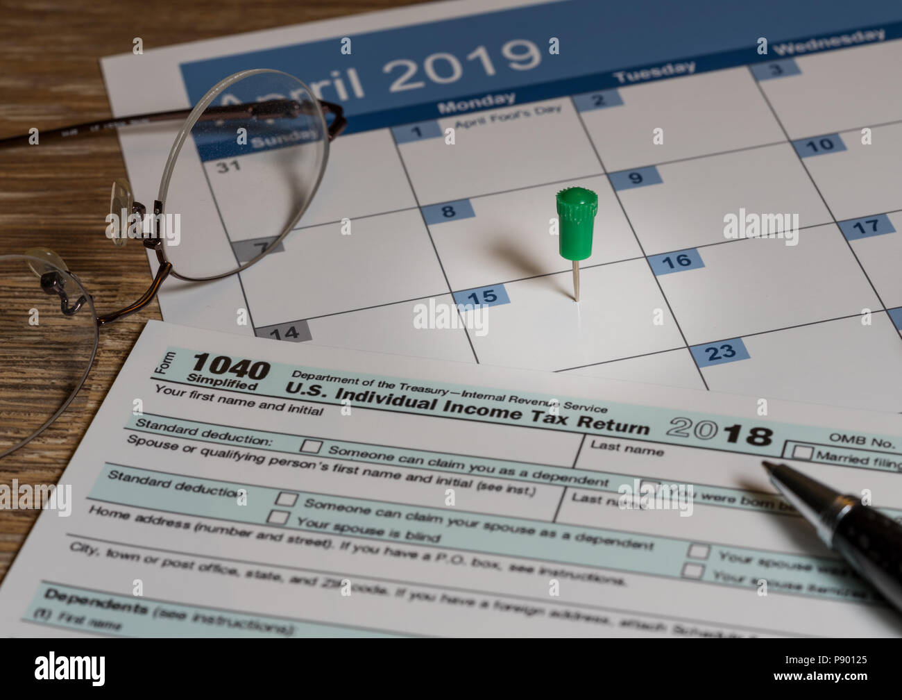 Form 1040 Simplified allows filing of taxes on postcard Stock Photo - Alamy