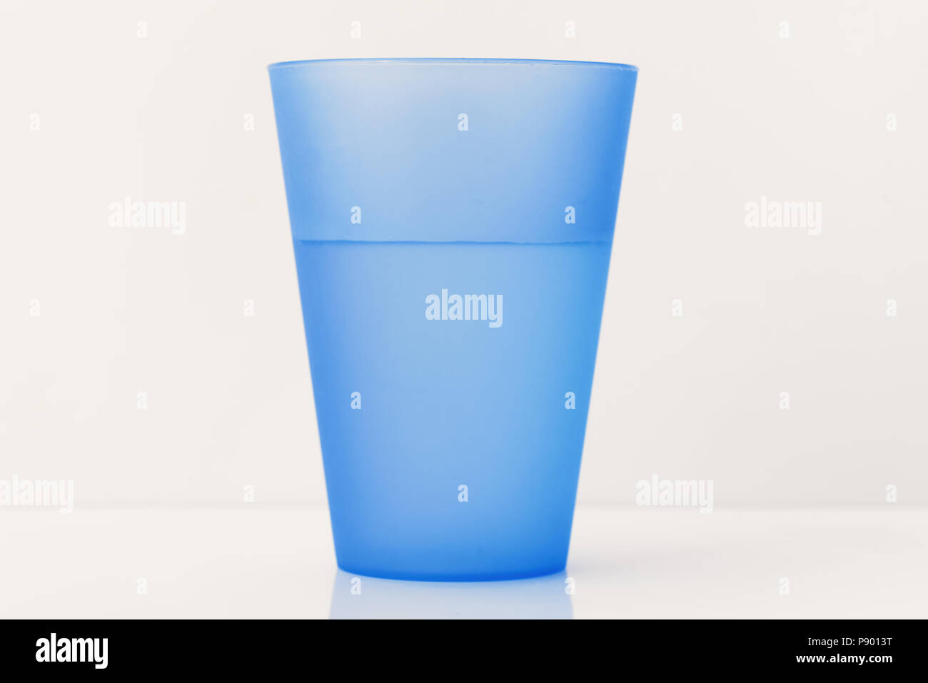 Plastic glass. Plastic cup with water on white background Stock Photo ...
