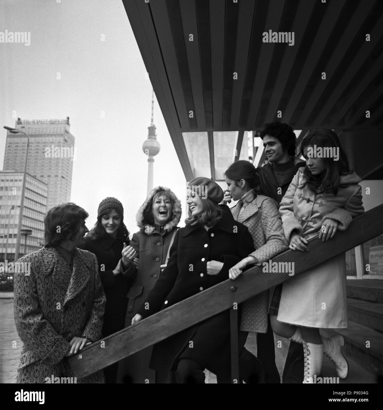 Berlin, GDR, young people wearing the latest winter fashion in the city ...