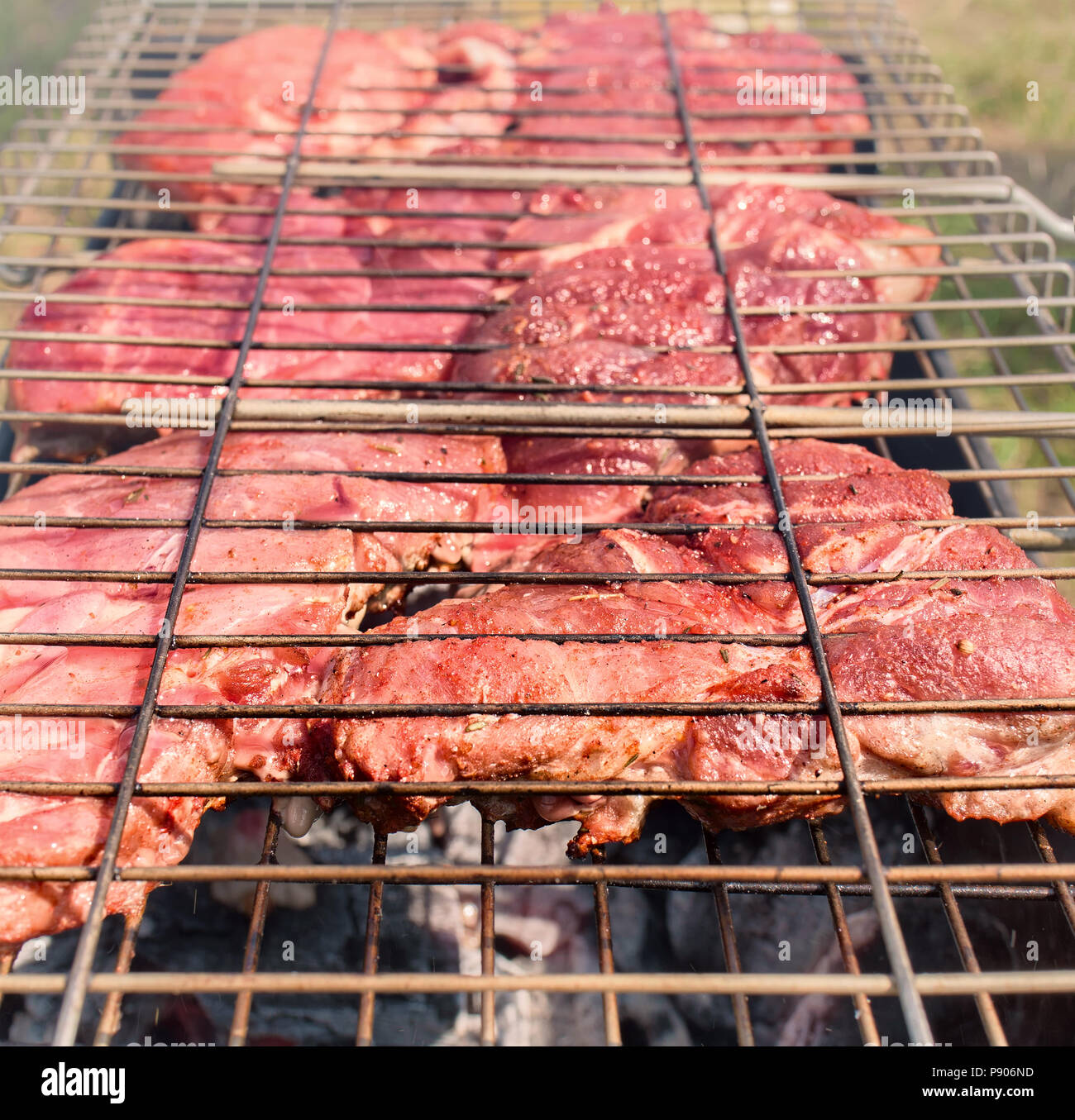 Beef grilled steak. Cooking meat on grill Stock Photo - Alamy