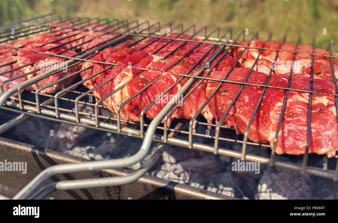 Beef grilled steak. Cooking meat on grill Stock Photo - Alamy