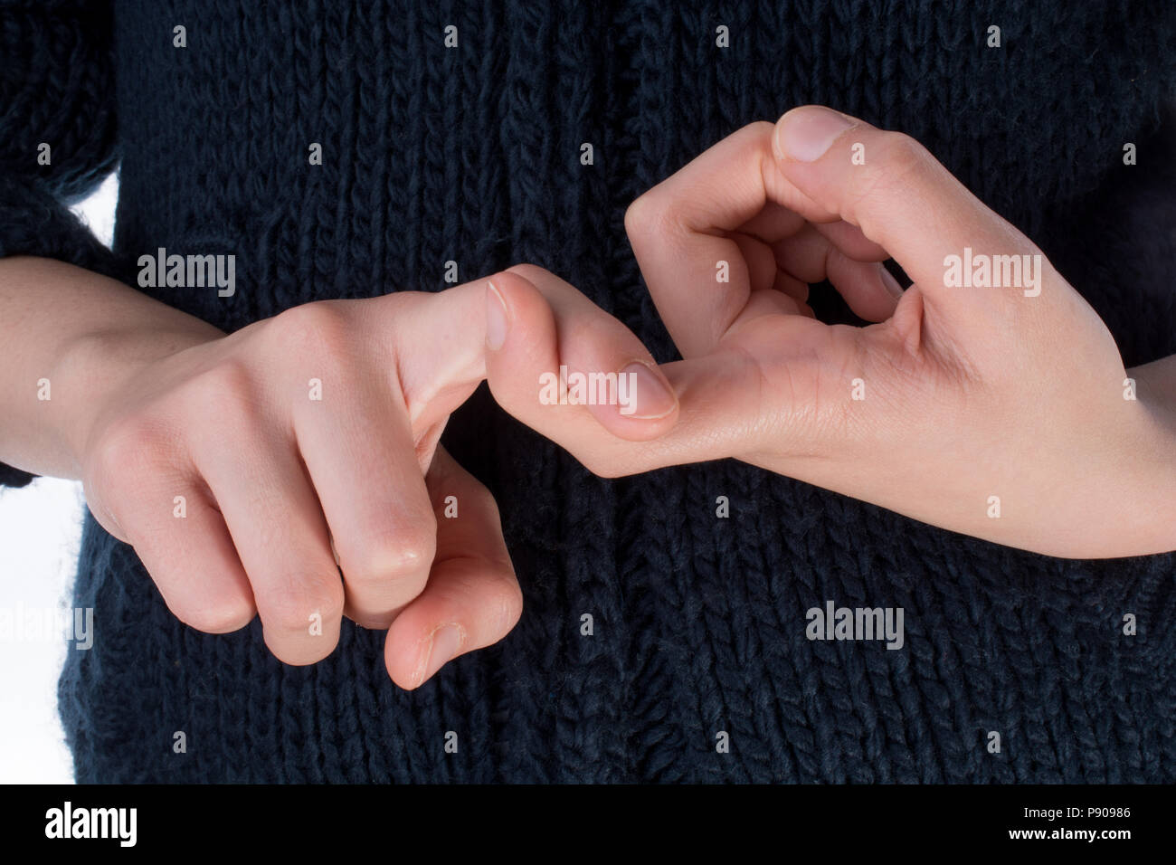 Hand making a gesture on a white background Stock Photo - Alamy