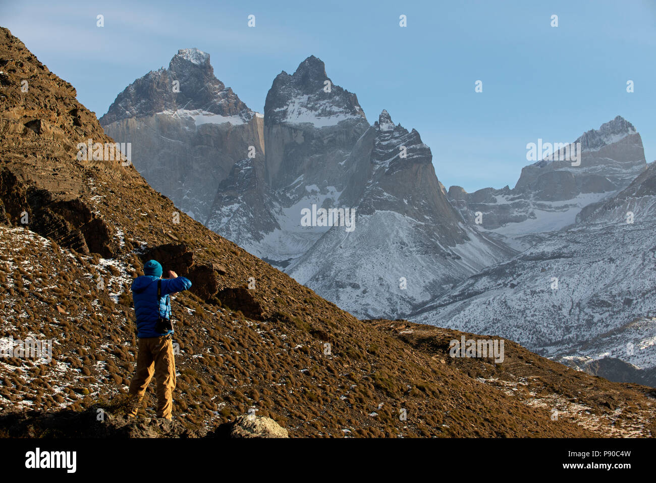 Tourist on side of mountain looking across to the Horns of Paine , part ...