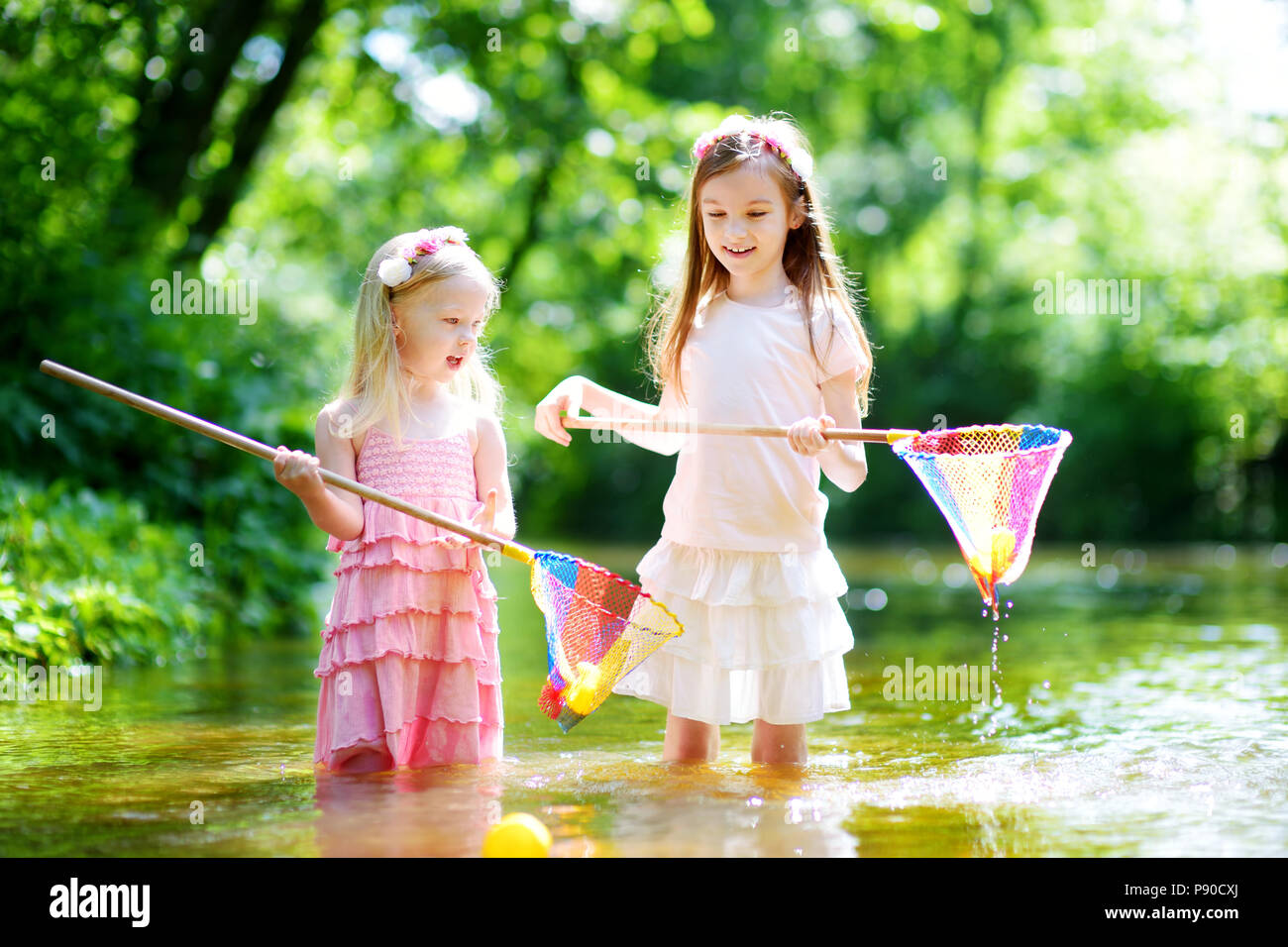 Kids catching fish hi-res stock photography and images - Alamy