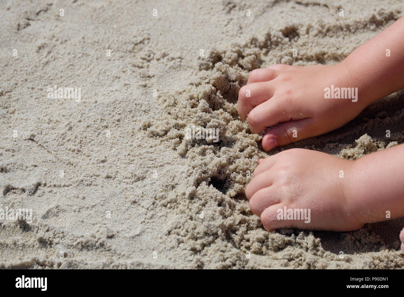 Touching Sand High Resolution Stock Photography and Images - Alamy