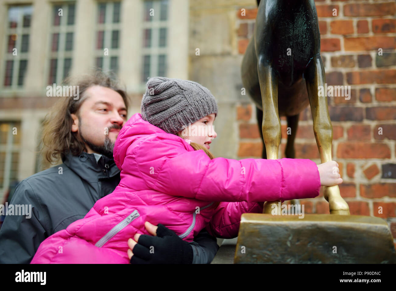 Child Touching Statue High Resolution Stock Photography and Images - Alamy