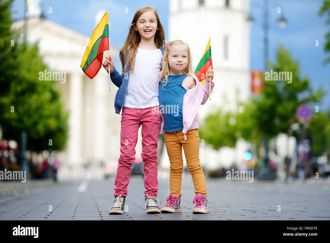 Two adorable little sisters celebrating Lithuanian Statehood Day ...