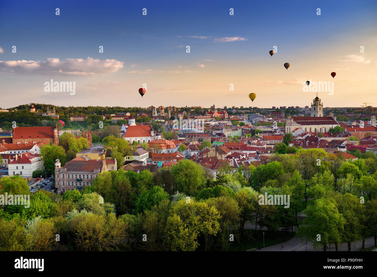 Beautiful summer panorama of Vilnius old town with colorful hot air ...