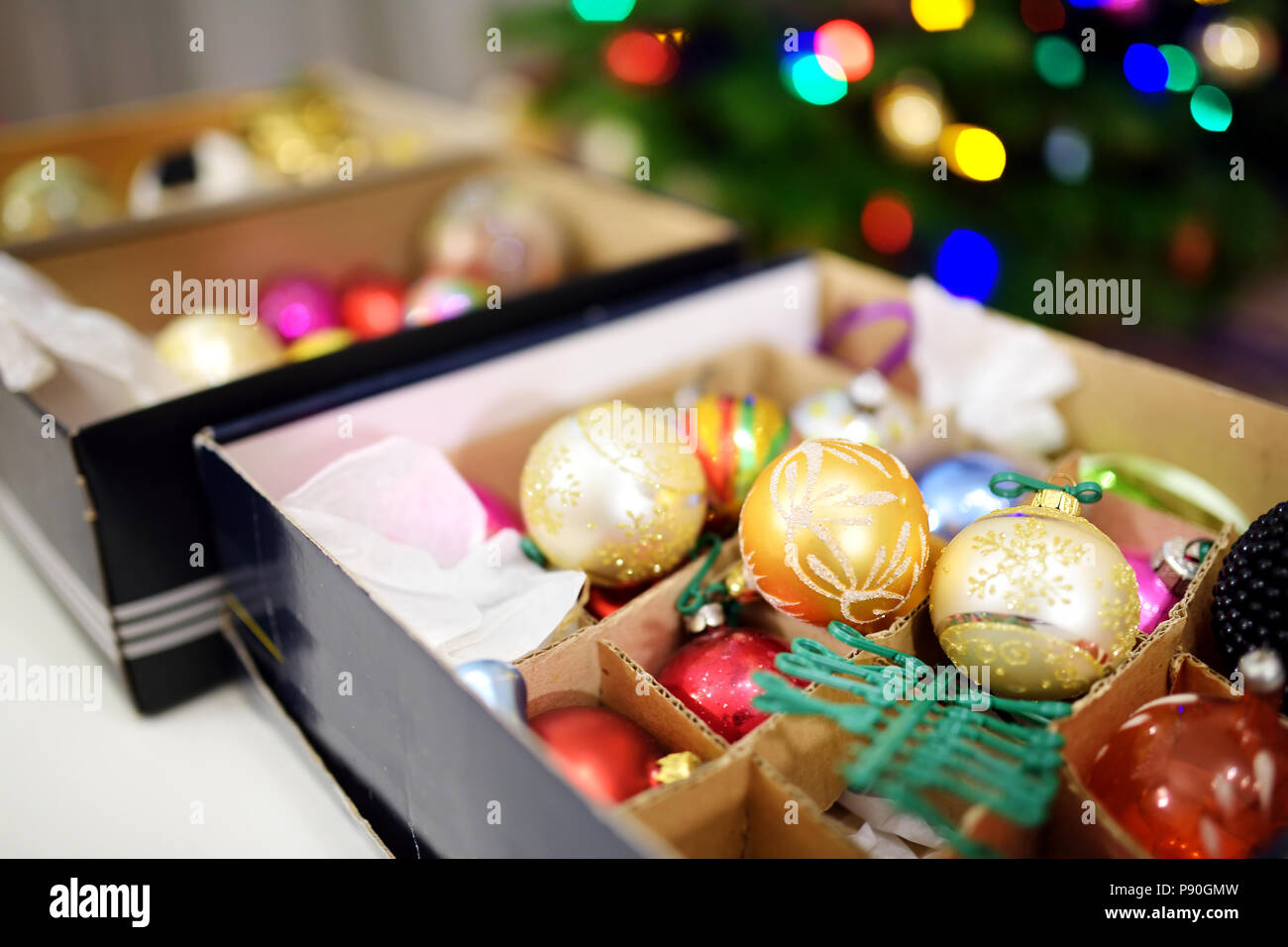 Various colorful Christmas decorations in a boxes Stock Photo - Alamy
