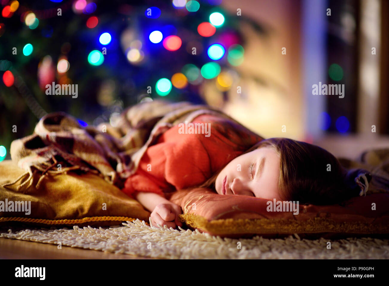 Child girl under tree sleeping hi-res stock photography and images - Alamy
