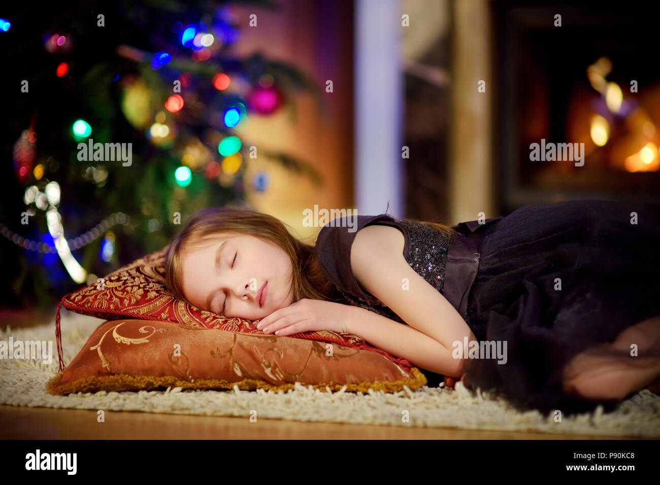 Child girl under tree sleeping hi-res stock photography and images - Alamy