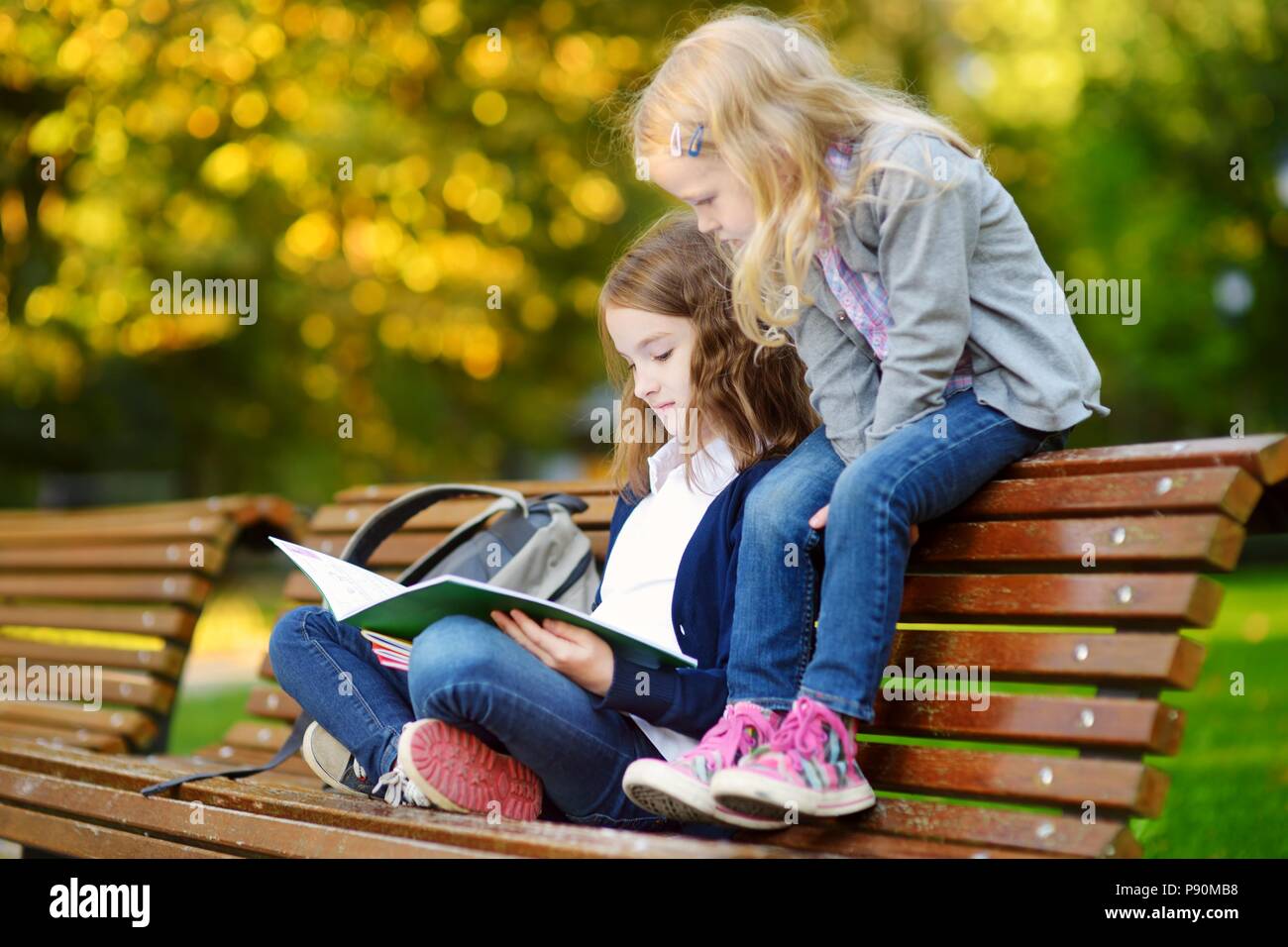 Schoolgirls in the park hi-res stock photography and images - Alamy