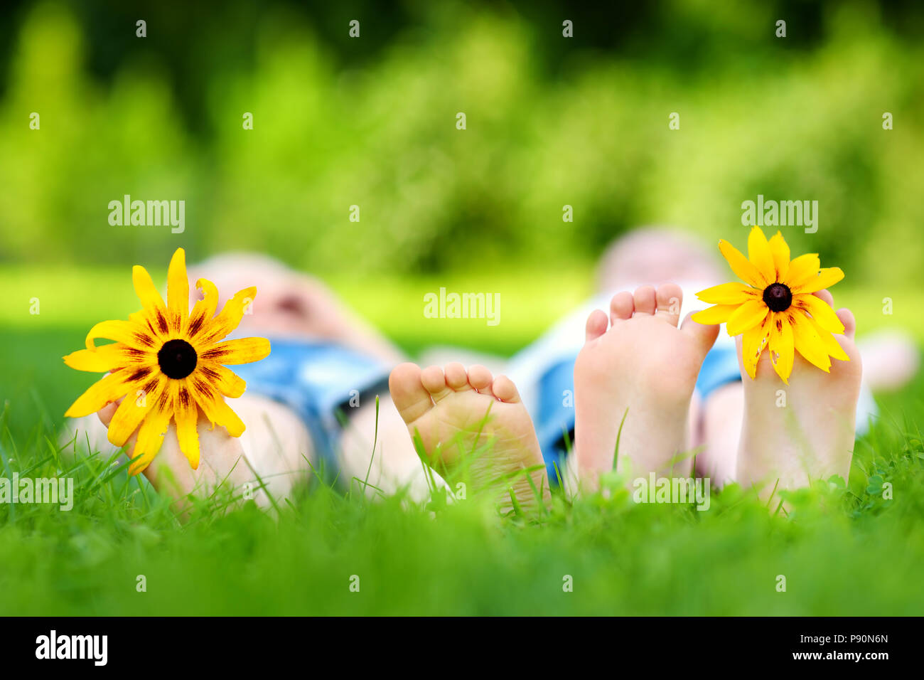 Two feet barefoot meadow hi-res stock photography and images - Alamy
