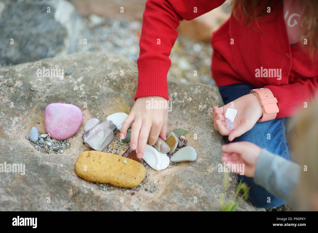 Collecting pebbles beach hi-res stock photography and images - Alamy