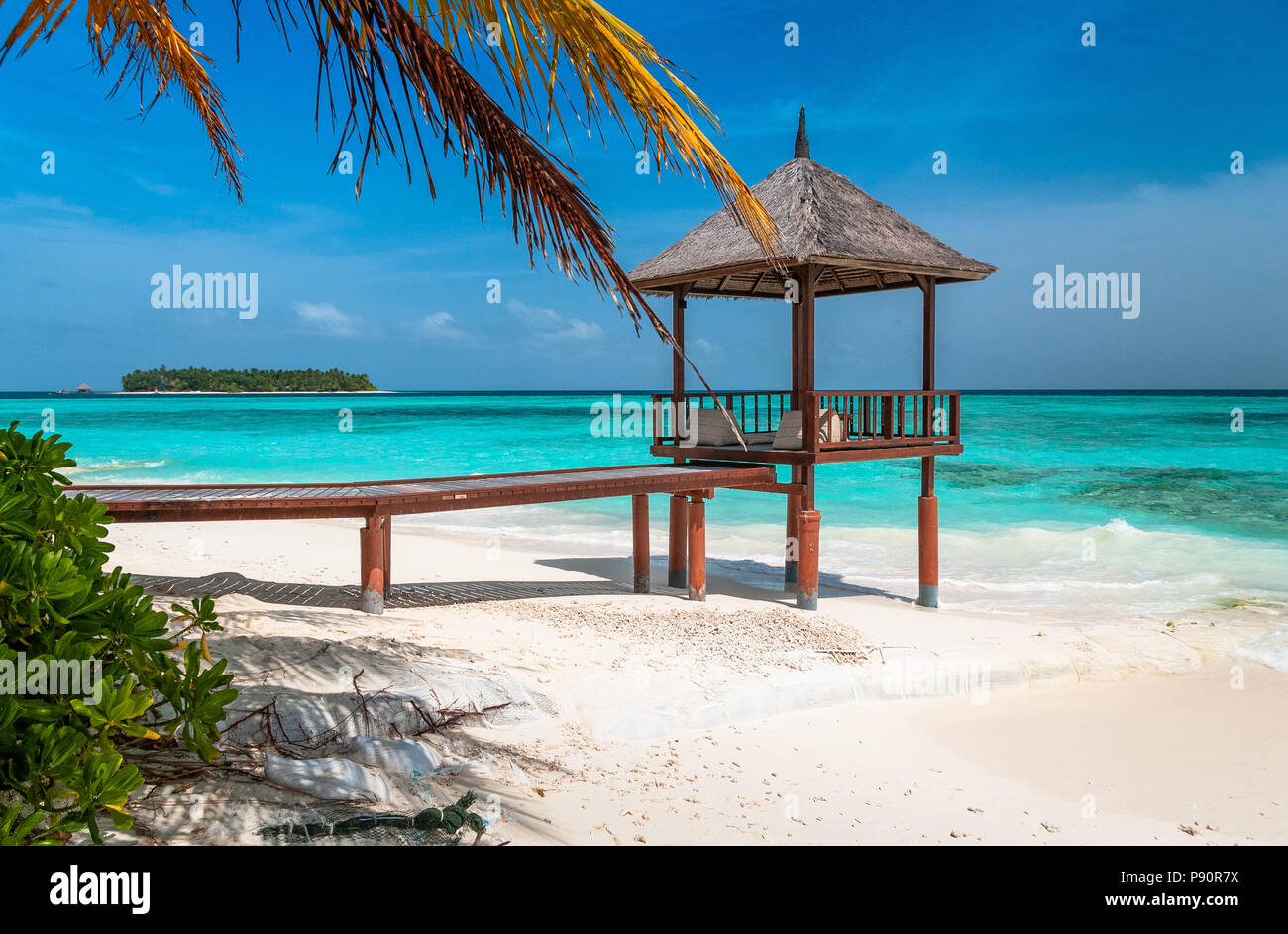 Tropical landscape. Beach with white sand a turquoise ocean. Maldives ...