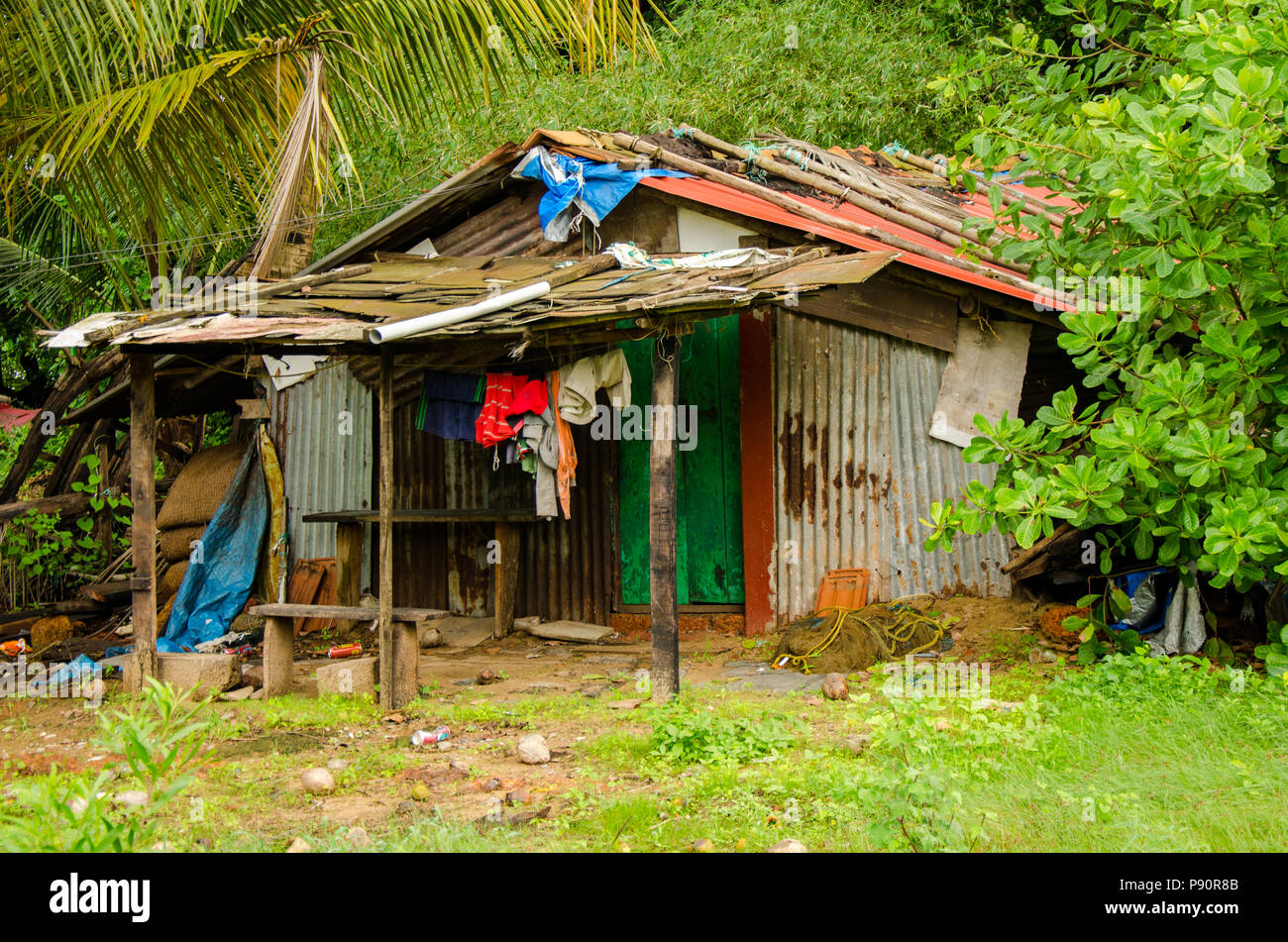Badly constructed shanty made of tin sheets at the entrance of Betul ...