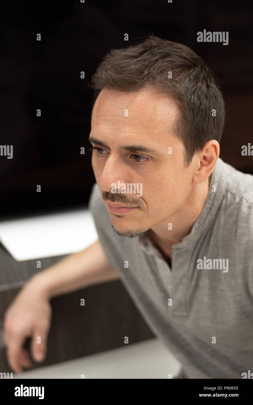 Man profile portrait, blurred background, vertical image Stock Photo ...