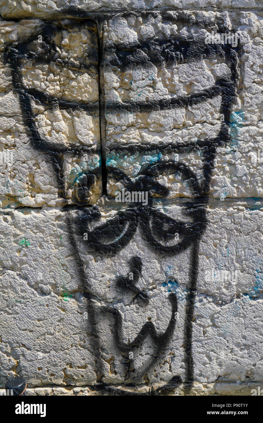 A joint with human face, painting, Lyon, France Stock Photo - Alamy