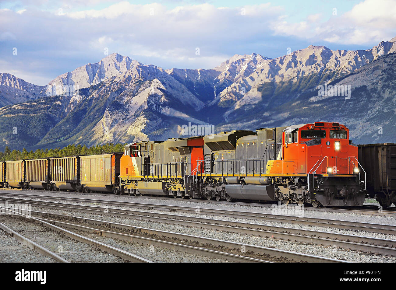 Long freight train arrives hi-res stock photography and images - Alamy