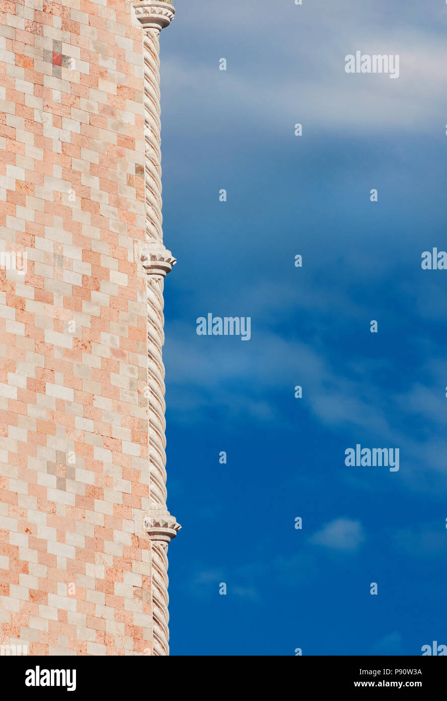 Gothic architecture in Venice. Doge Palace corner with blue sky and ...