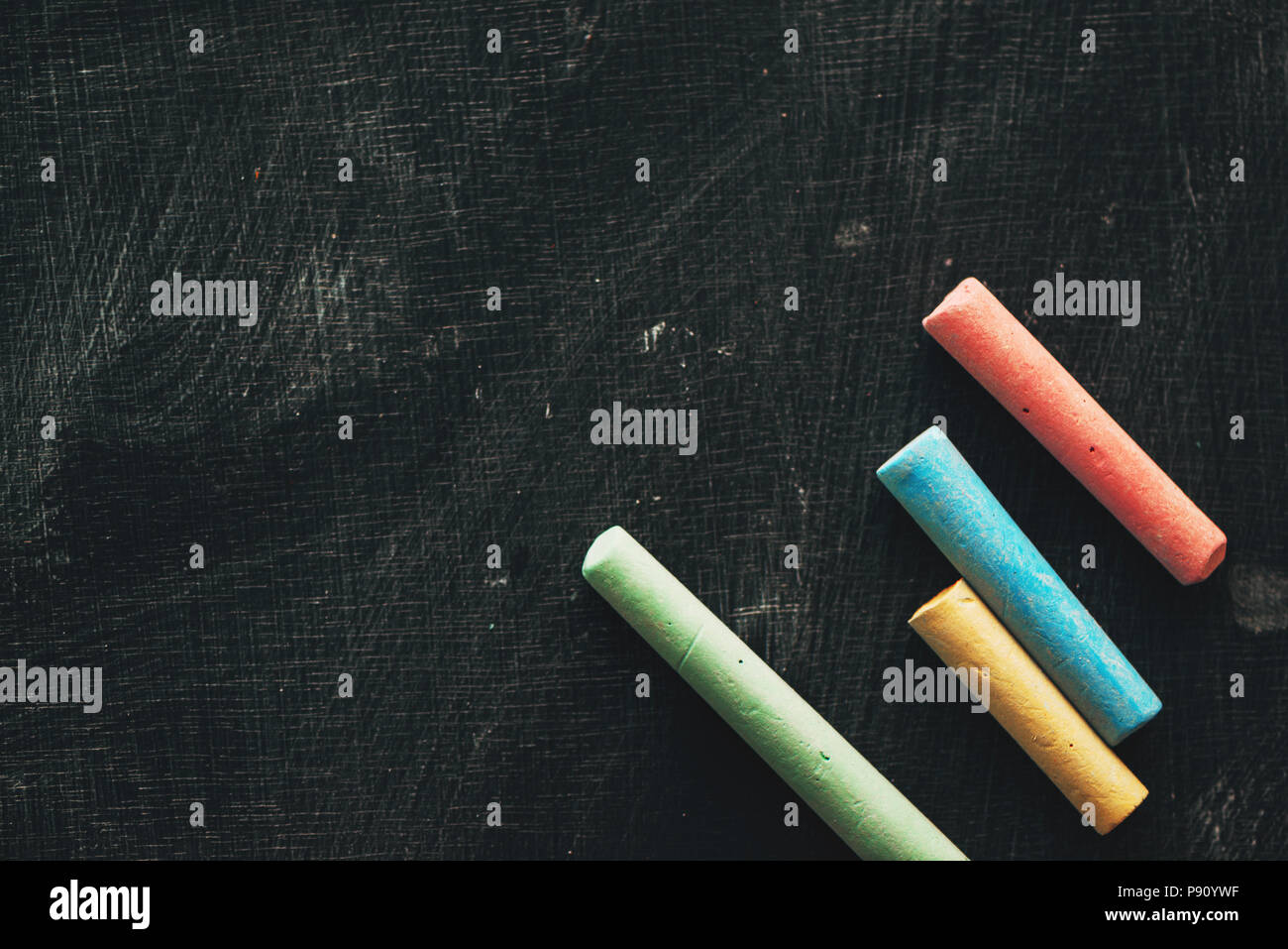 Colorful chalk on blackboard, concept of creativity and education Stock ...