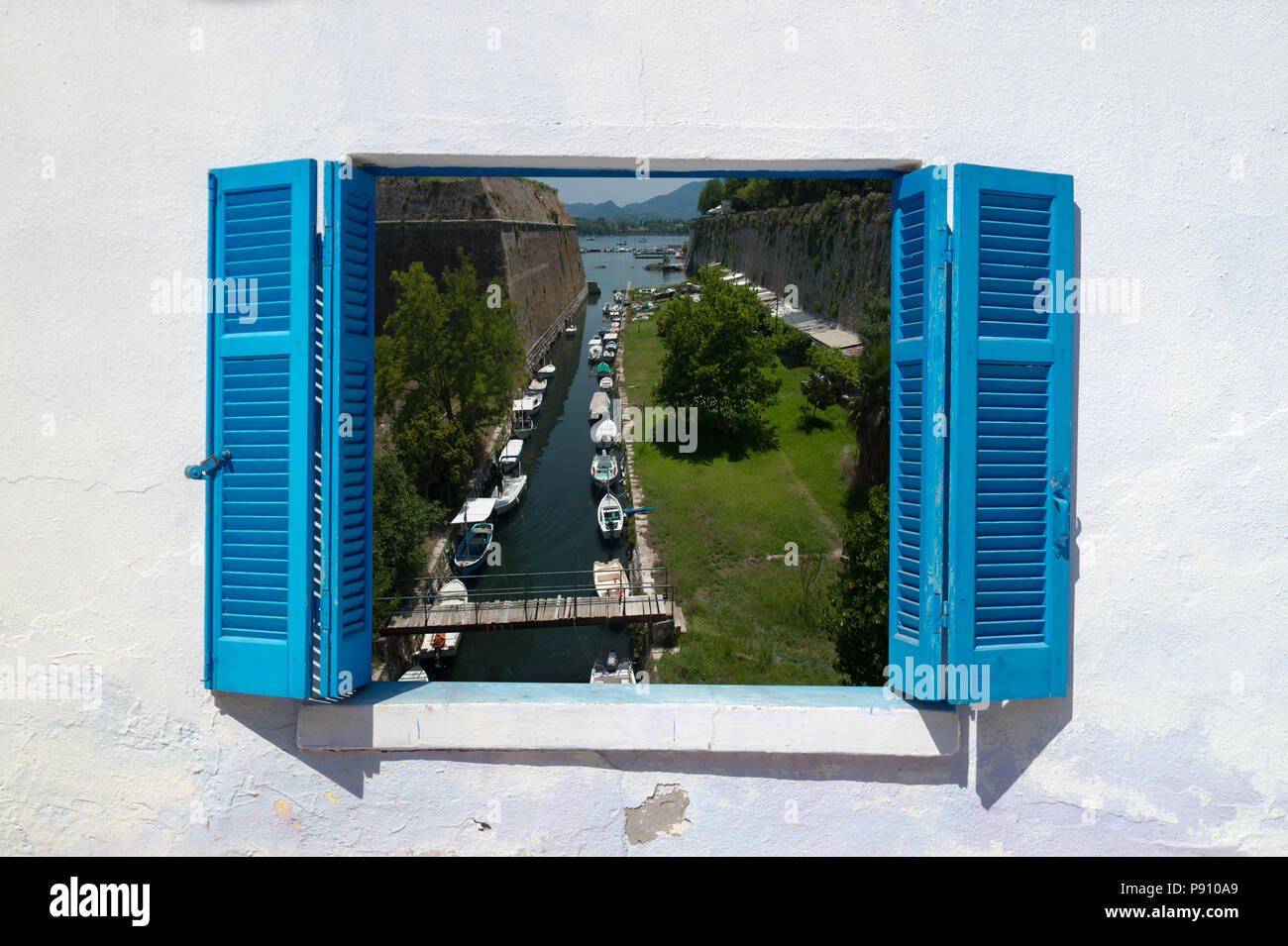 Sea view through traditional greek window Stock Photo - Alamy
