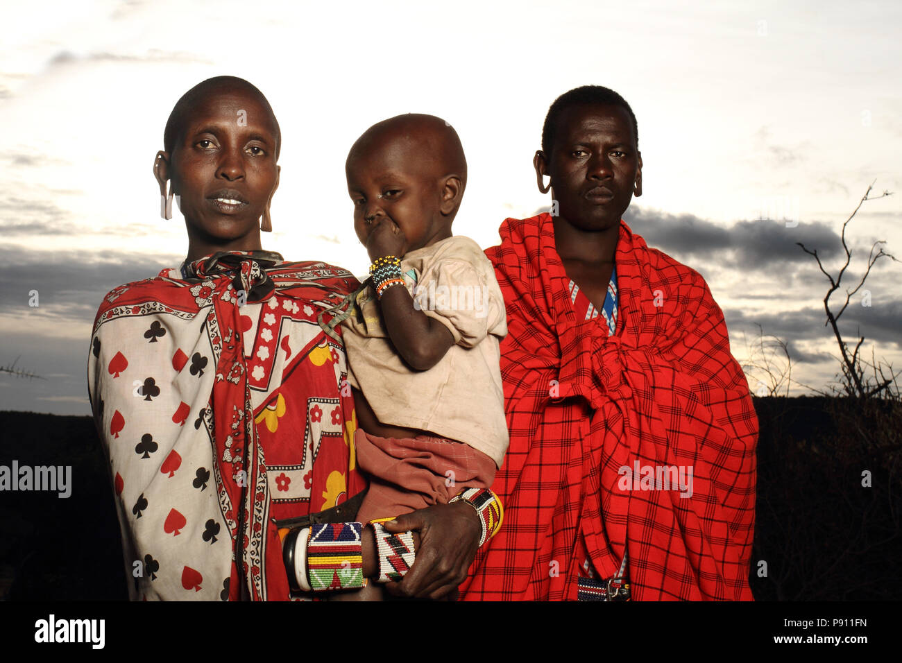 Masai man and women, husband and wife Masai family dressed in ...