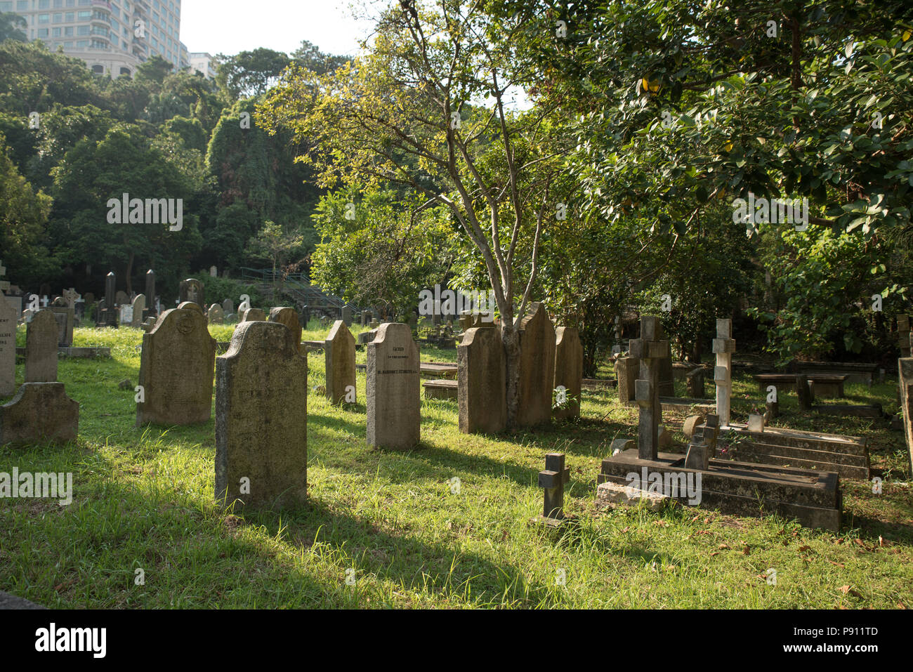 Cemetery in Hong Kong downtown on sunny day Stock Photo - Alamy